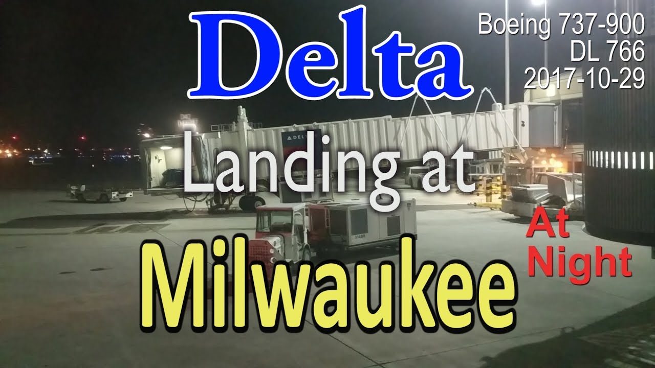 Delta flight landing at Milwaukee airport at night in Boeing 737-900 ...