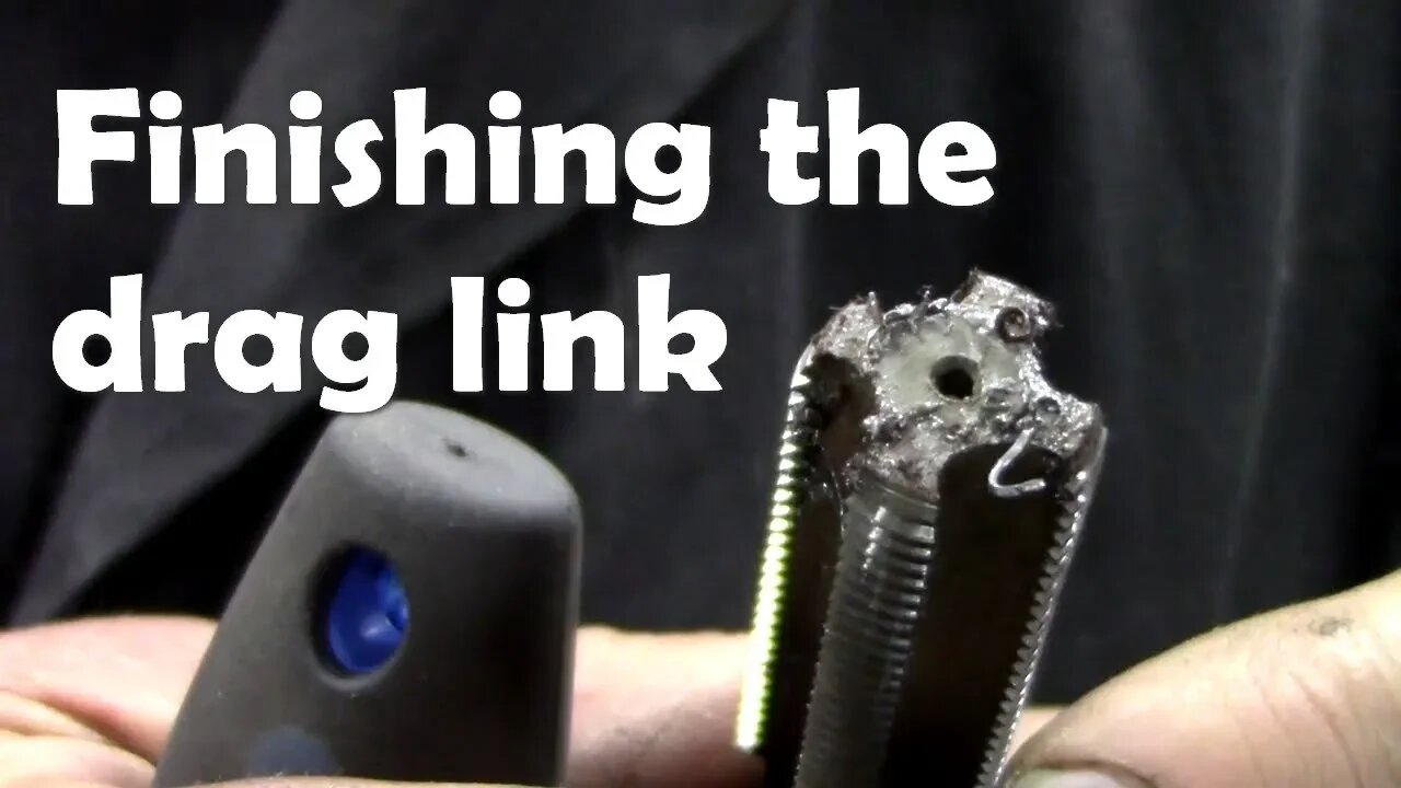 Defender drag link - cleaning the thread with a tap and setting the length