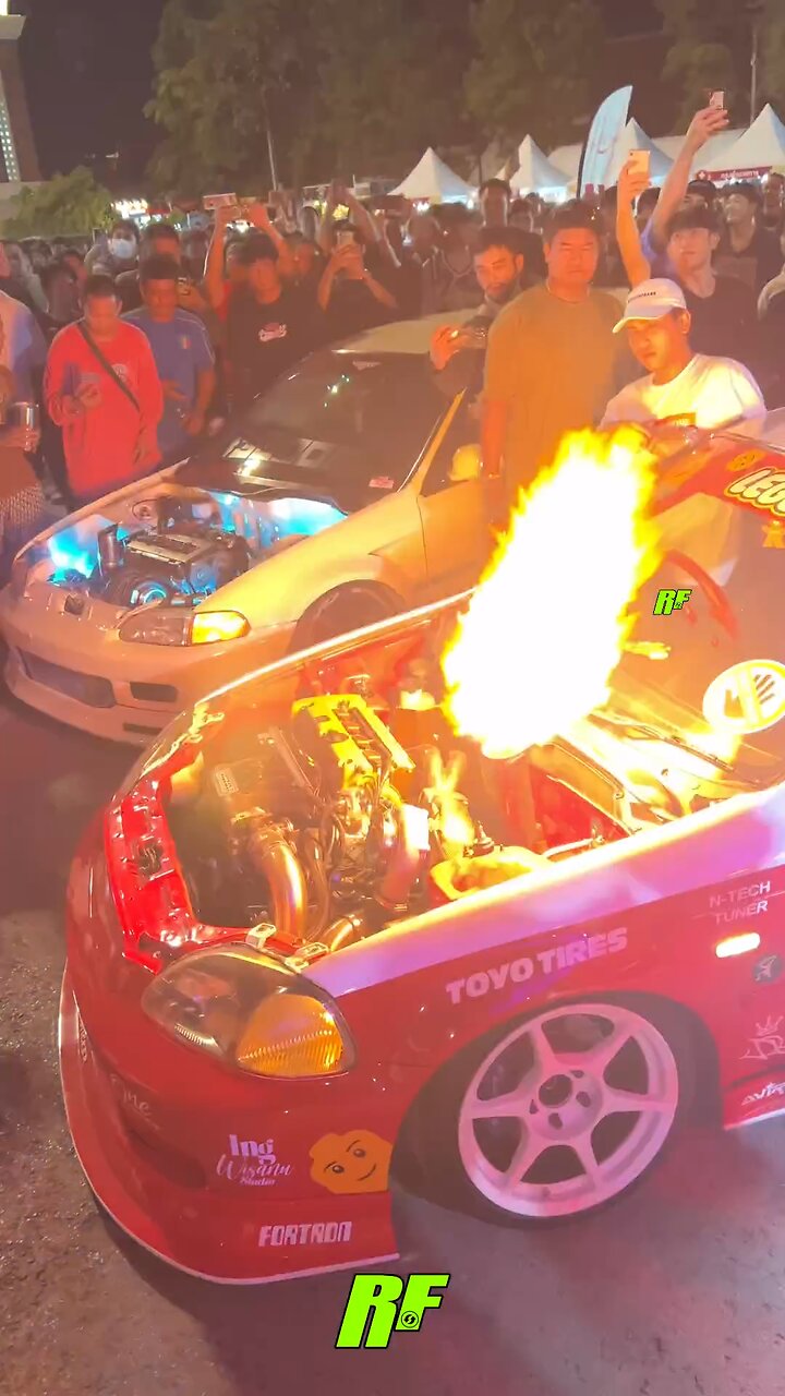 Hatchback Honda Civic with massive flames