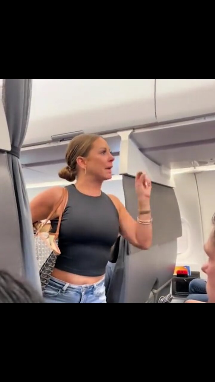 Woman Has Meltdown Over 'Not Real' Person On The Plane Woman Has Meltdown Over 'Not Real' Person On The Plane