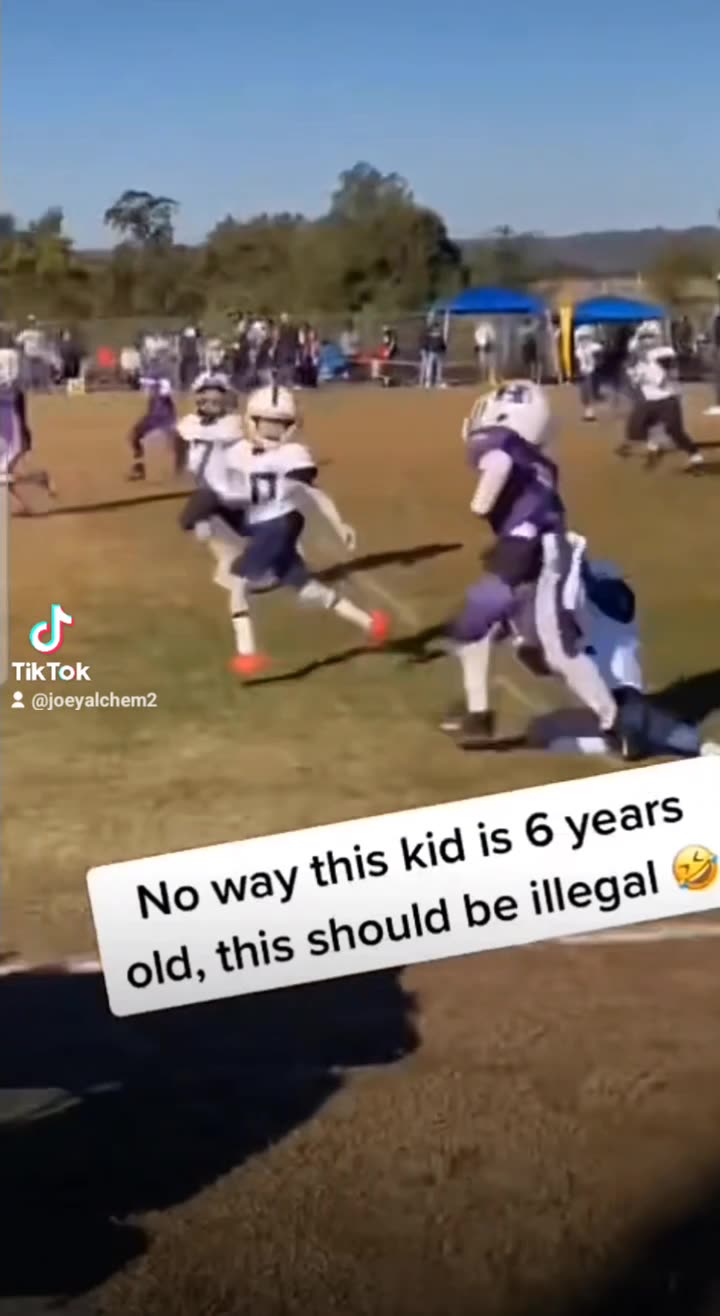 Kids playing football