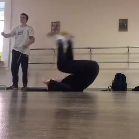 Girl does handstand and falls on her head