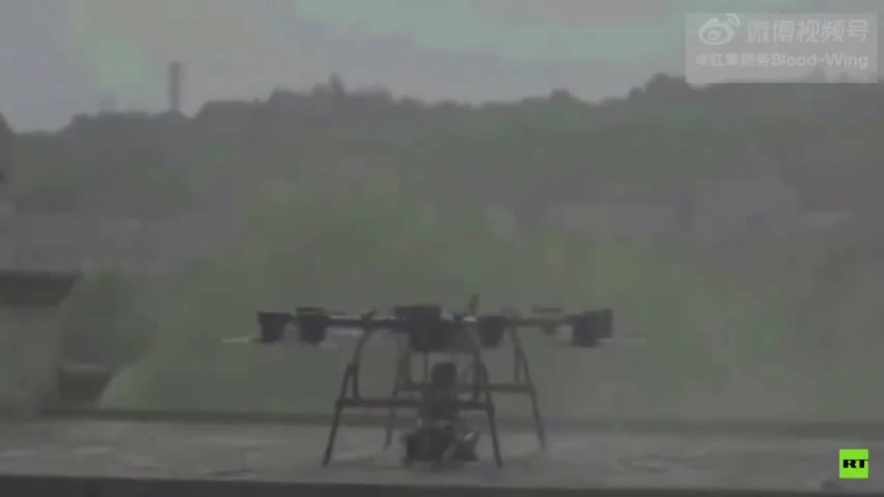 ROBOT ATTACK DOG WITH MACHINE GUN DROPPED OFF BY DRONE