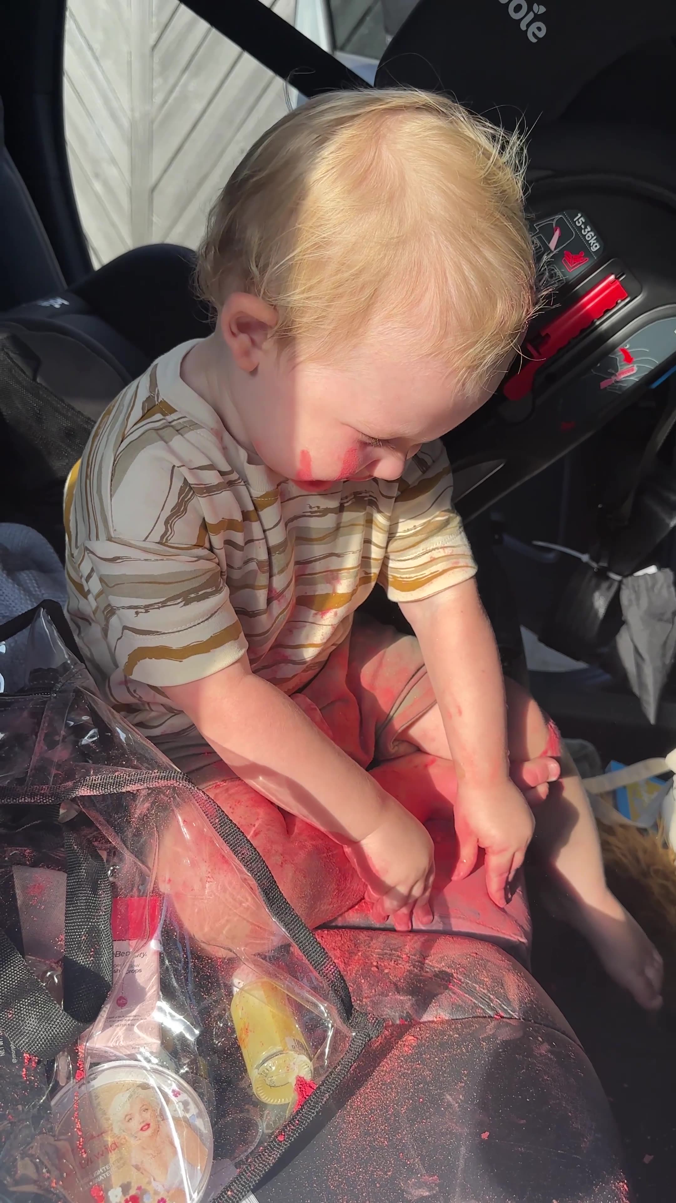 Boy Makes a Big Mess With Makeup in the Back Seat
