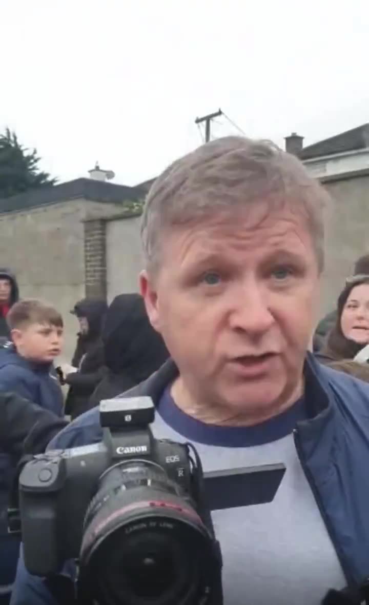 Irish men stand up to an RT Regime Reporter