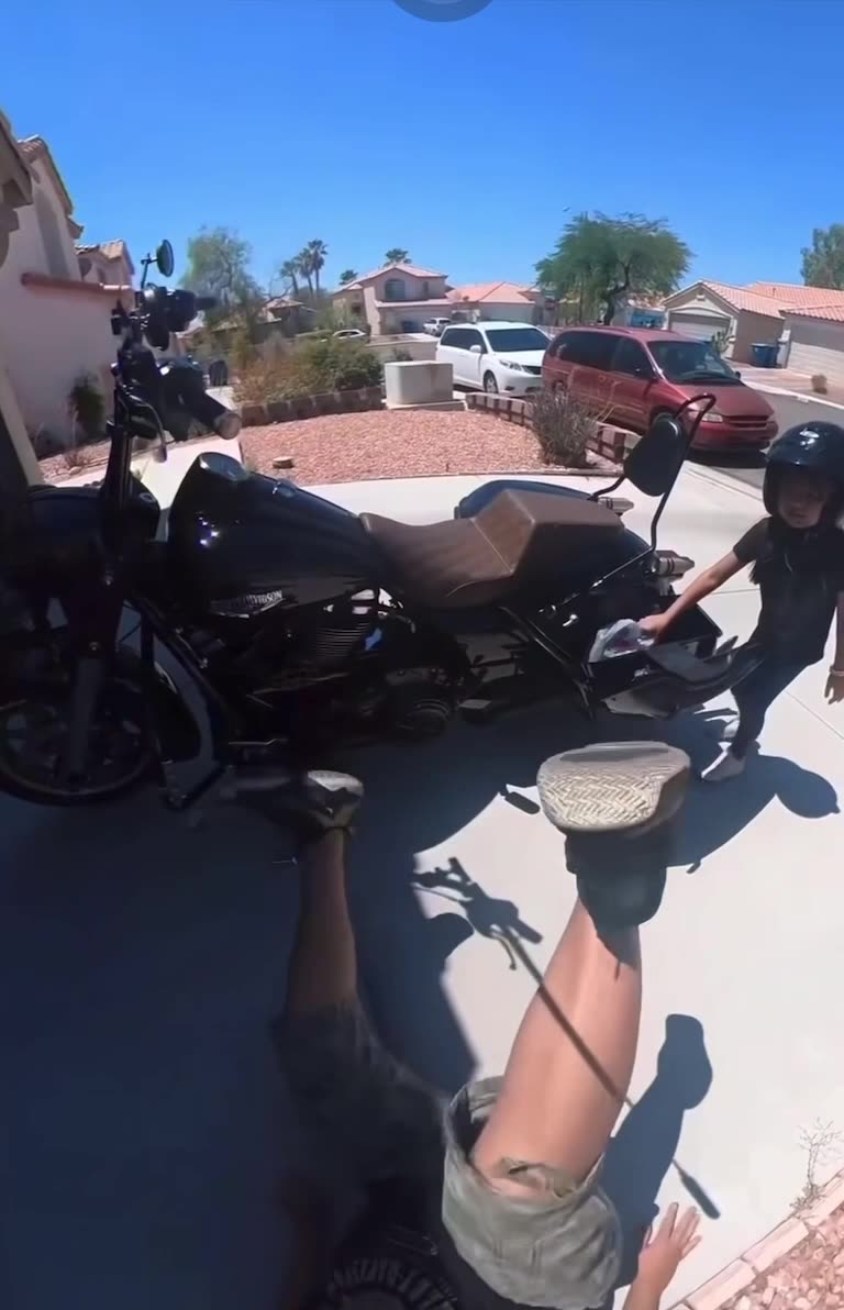 Daughter Accidently Causes Dad to Fall Off Motorcycle