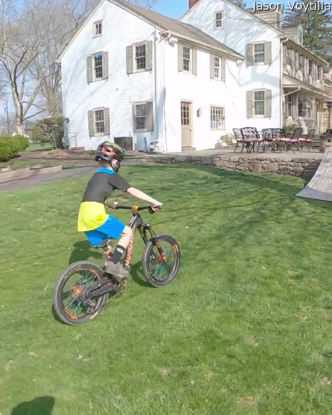 Boy Races Through Homemade BMX Track