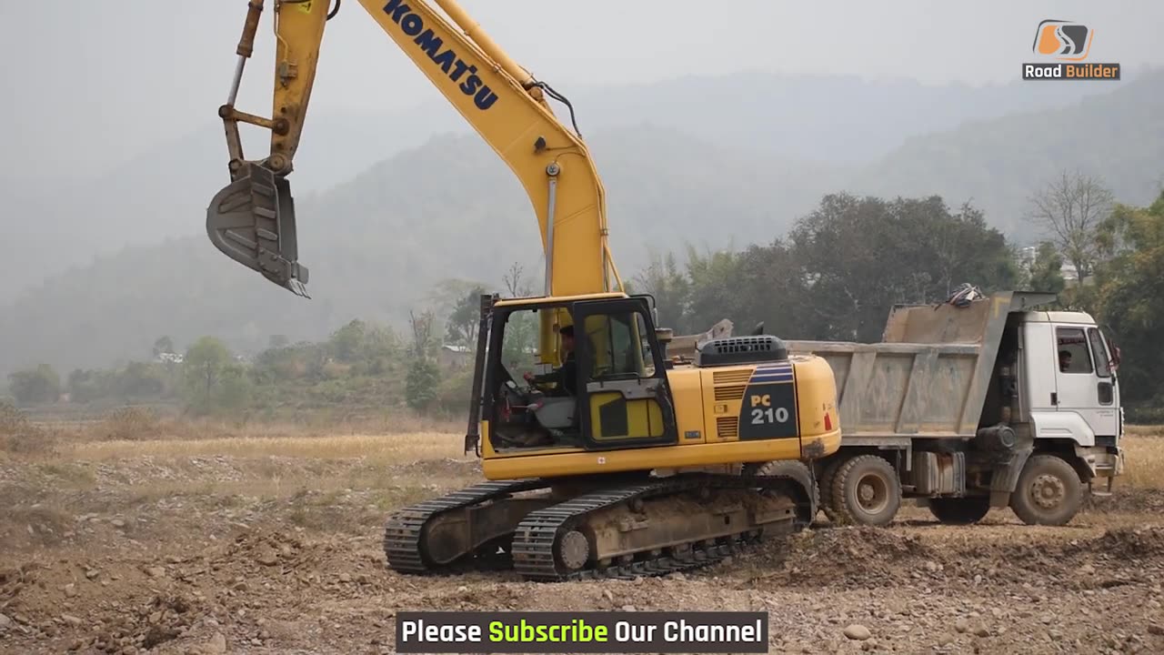 Komatsu Bulldozer Loading Sand On Dump Truck-Village Road Construction ...