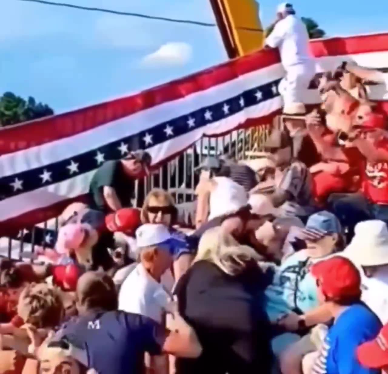 Video of Comperatore on the ground with what appears to be his family ...