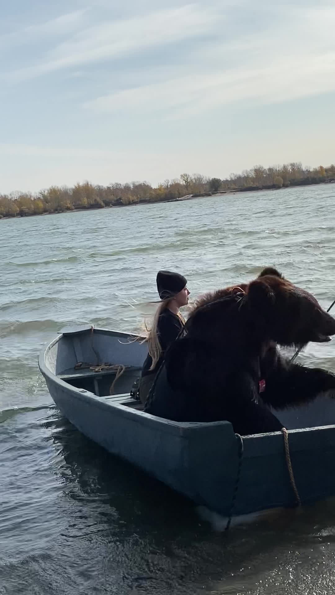 Woman Has a Fishing Trip with Archie the Brown Bear